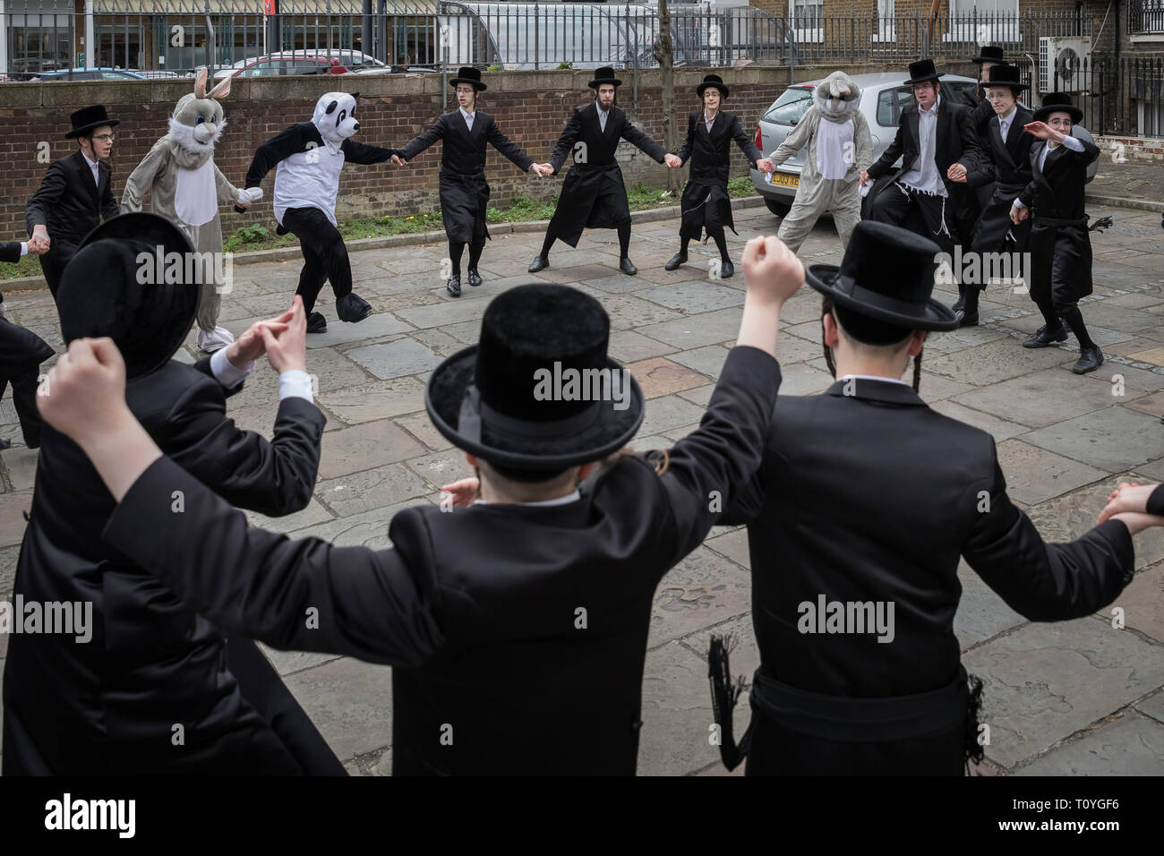 London, UK. 21st March, 2019. Haredi Jews in north London gather in ...