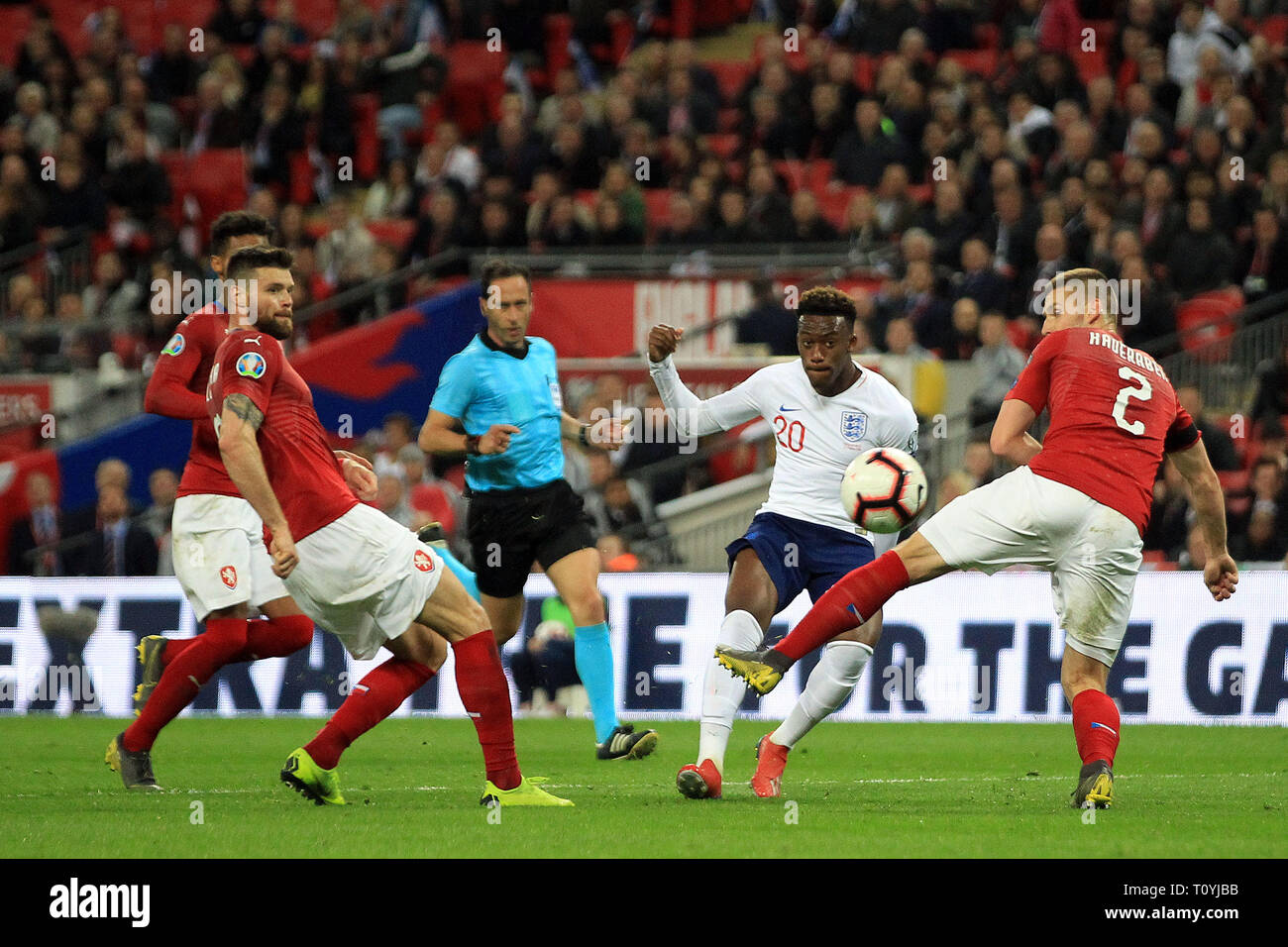 London, UK. 22nd Mar, 2019. Callum Hudson-Odoi of England (2L) takes a ...