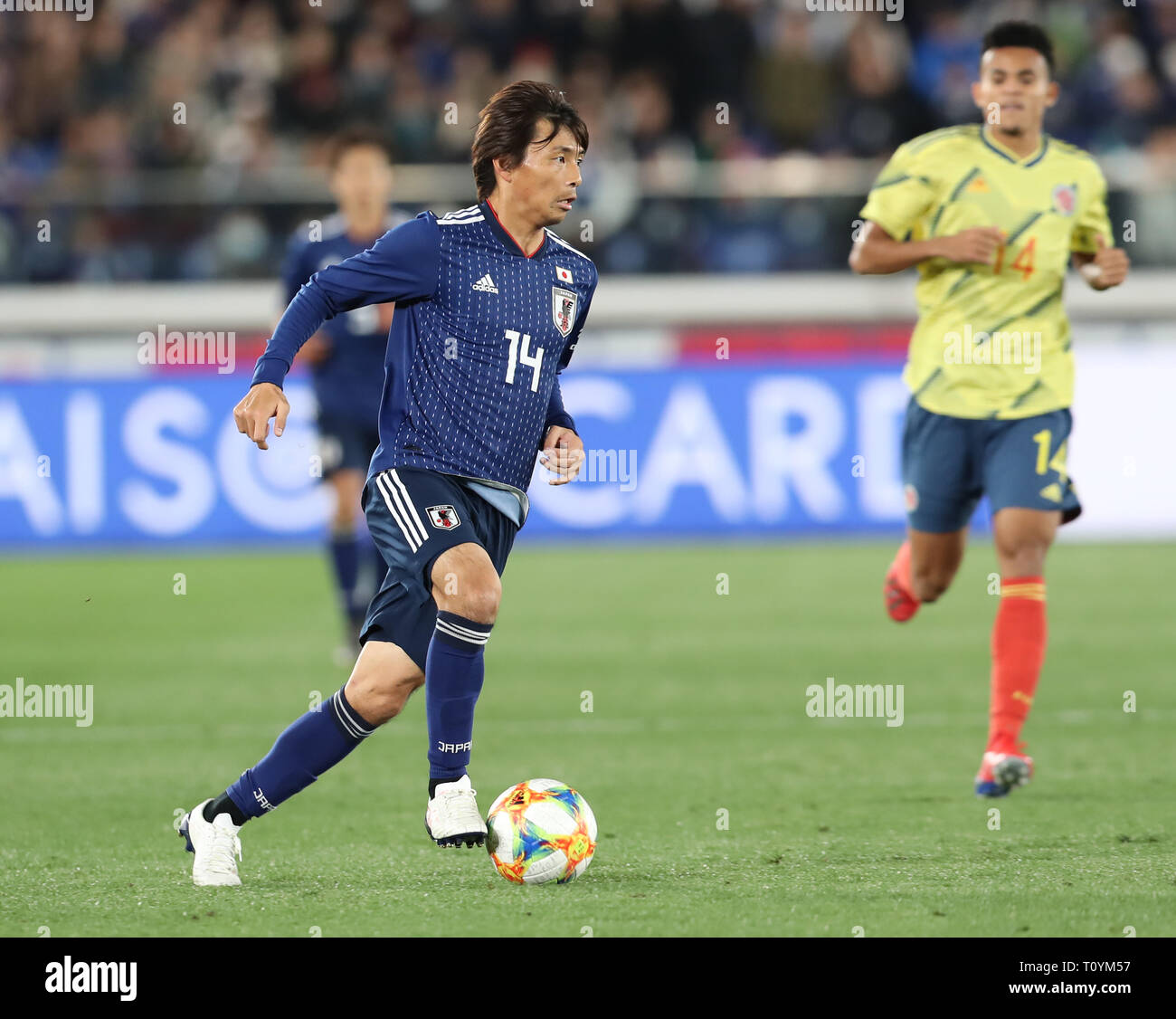 Yokohama, Japan. 22nd Mar, 2019. Japan's Takashi Inui () fights the ...