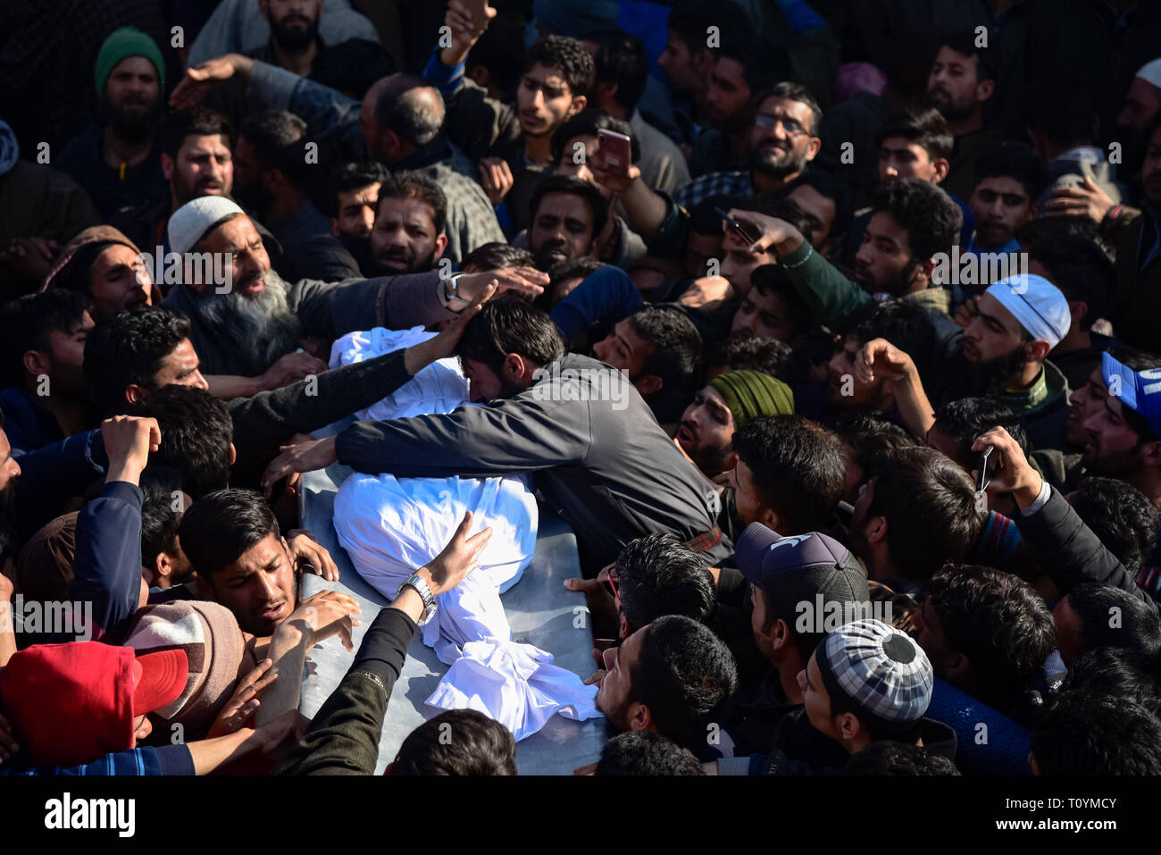 A relative seen hugging dead body of slain 11 year old boy Atif Shafi ...