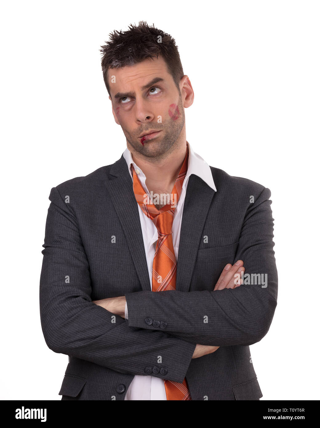 Close up of a businessman with bloody lip, beaten and bruised, isolated ...
