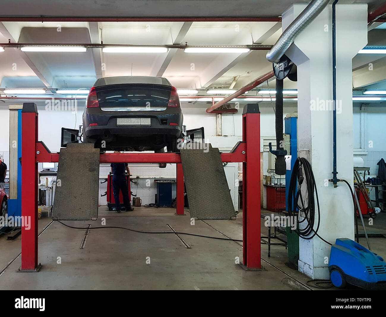 Raised vehicle inspection hi-res stock photography and images - Alamy