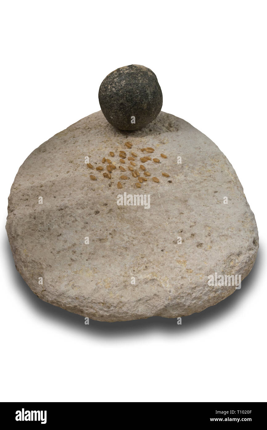Neolithic era simple mill stone. Isolated over white background Stock ...