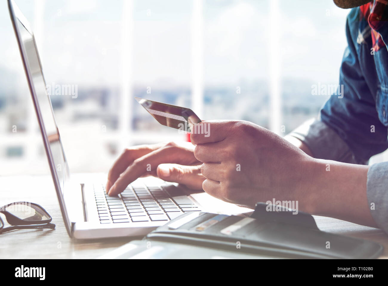 Online shopping with bank card Stock Photo - Alamy