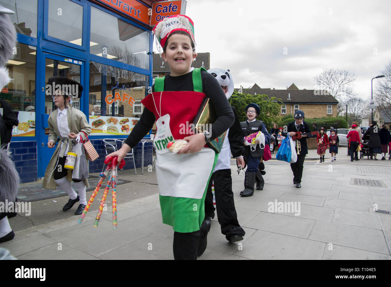Jewish children celebrating Purim in fancy dress, take to the streets ...