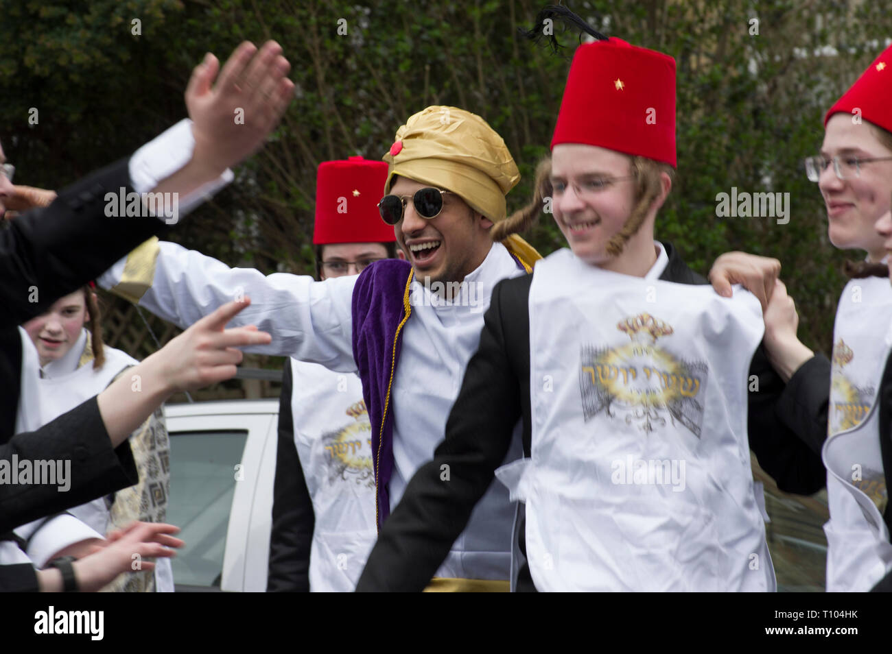 Hasidic boys young men in fancy dress in Stamford Hill dance and sing ...