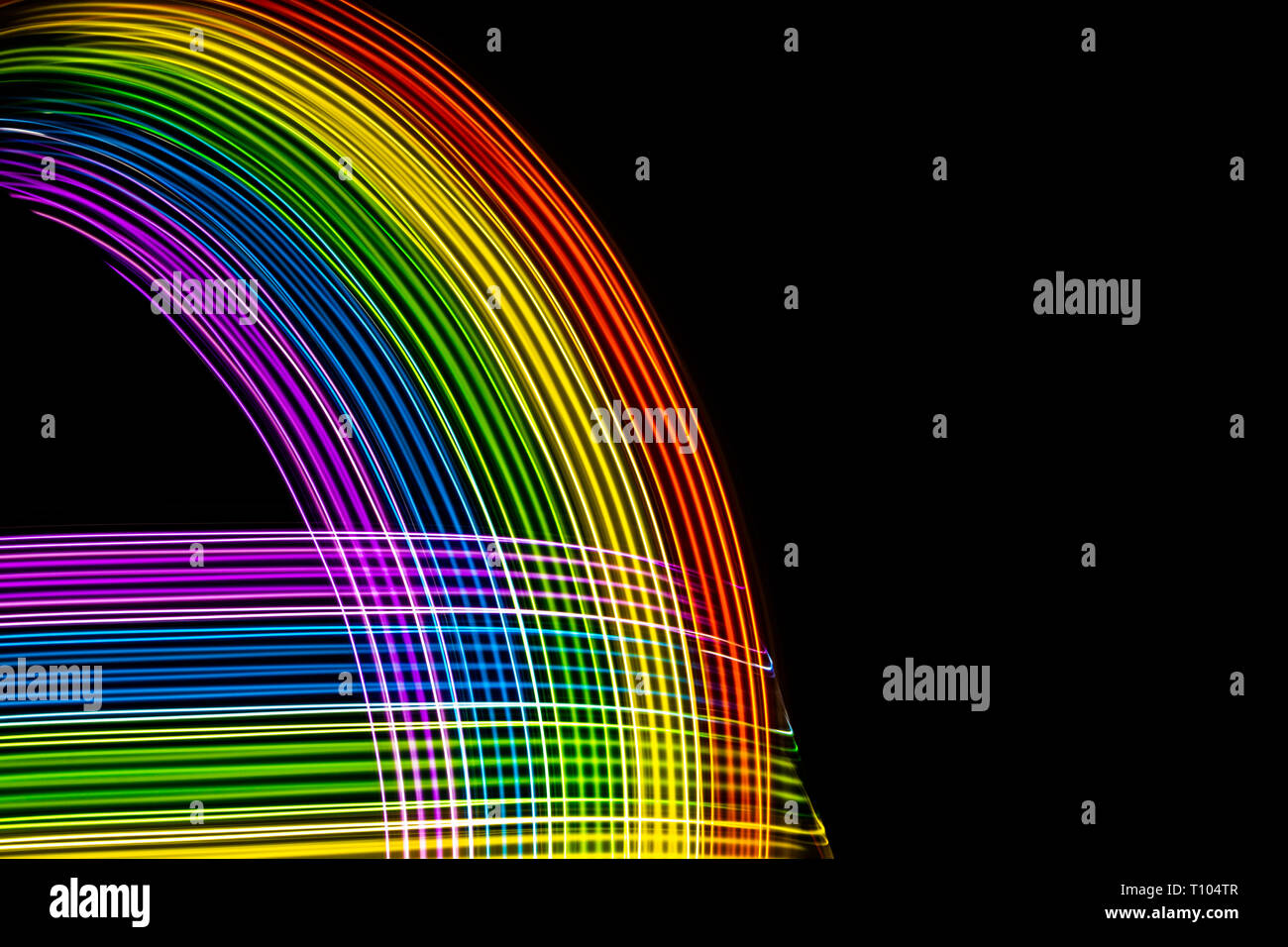 Multicolor lights on black background. Rainbow of vibrant colors curves ...