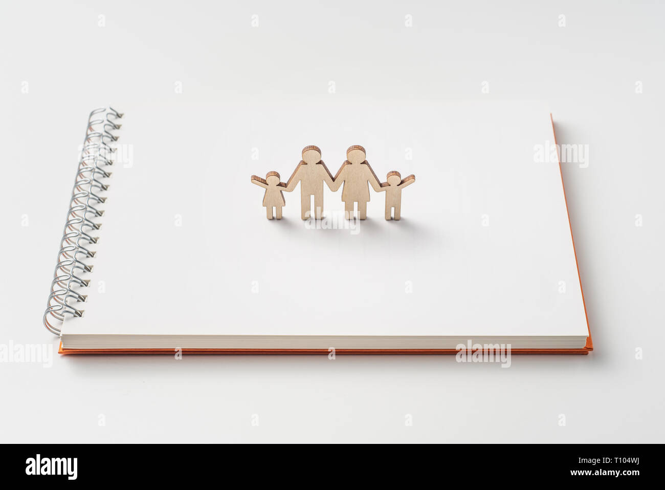 Design concept - perspective view of spiral orange notebook isolated on ...