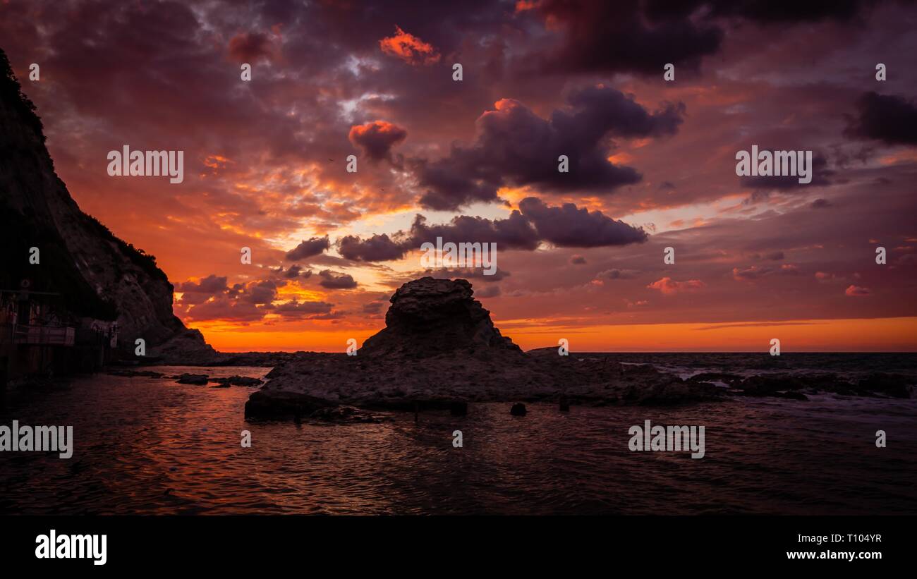 Sunset on Passetto beach Stock Photo - Alamy