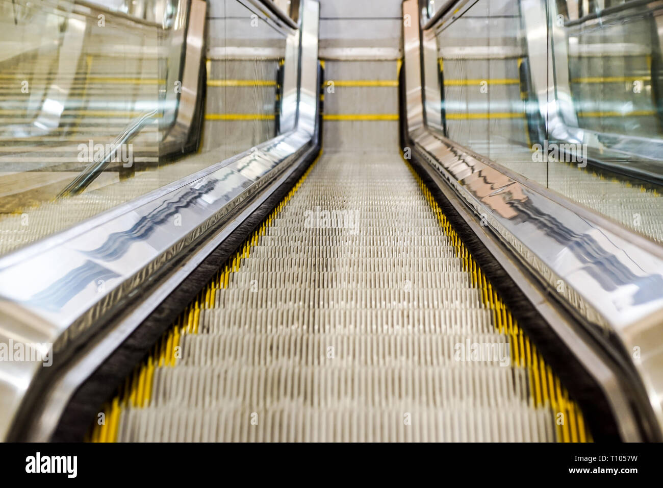 Mechanical escalators for people up and down, access detail Stock Photo ...