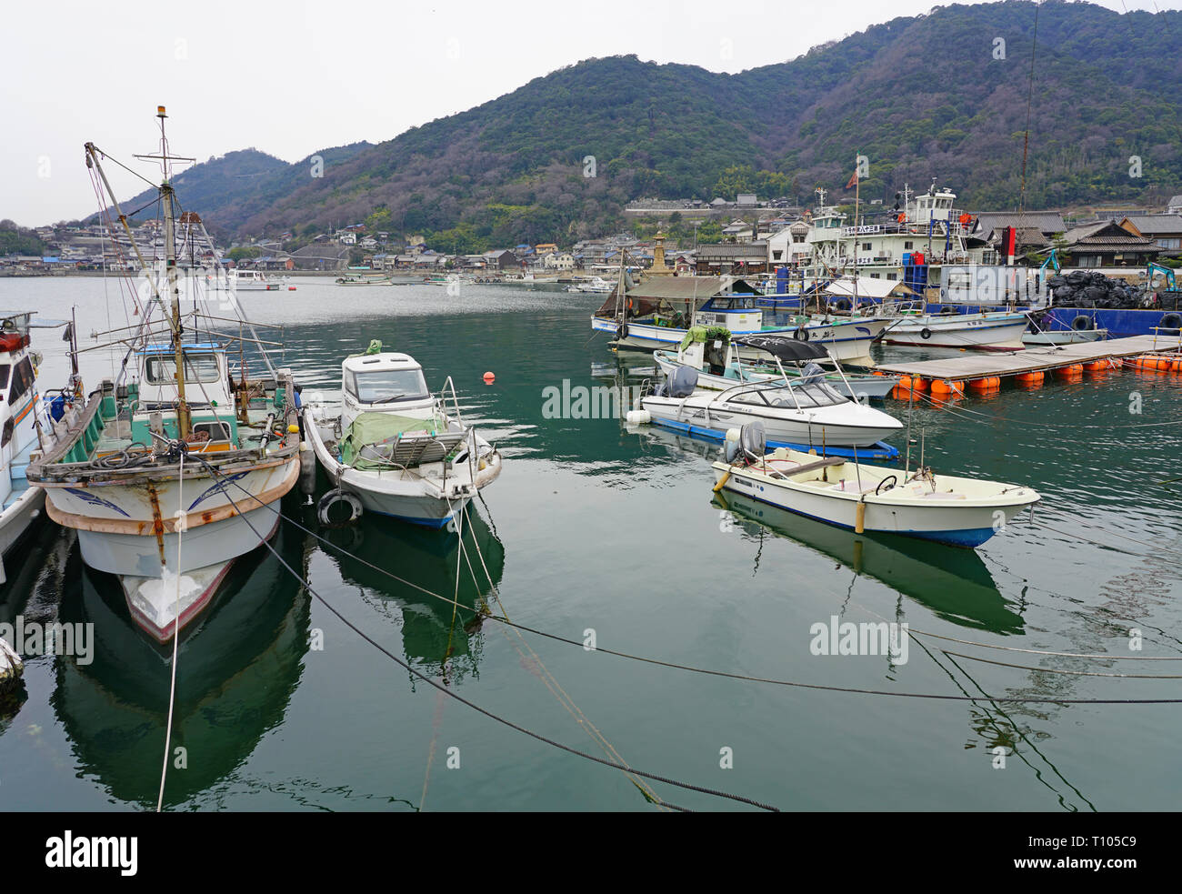 TOMONOURA, JAPAN –27 FEB 2019- Day view of boats in the harbor of ...