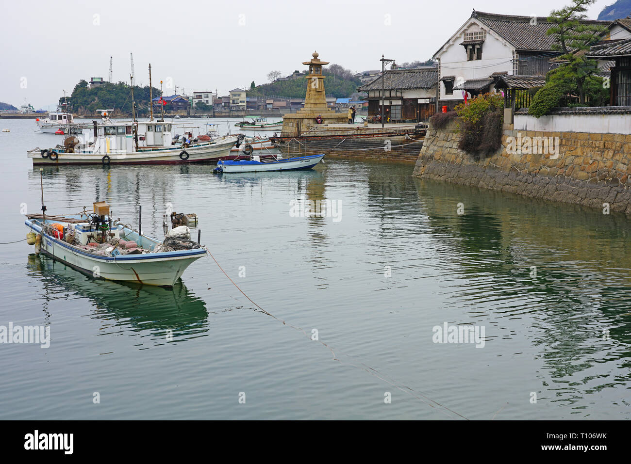 TOMONOURA, JAPAN –27 FEB 2019- Day view of boats in the harbor of ...