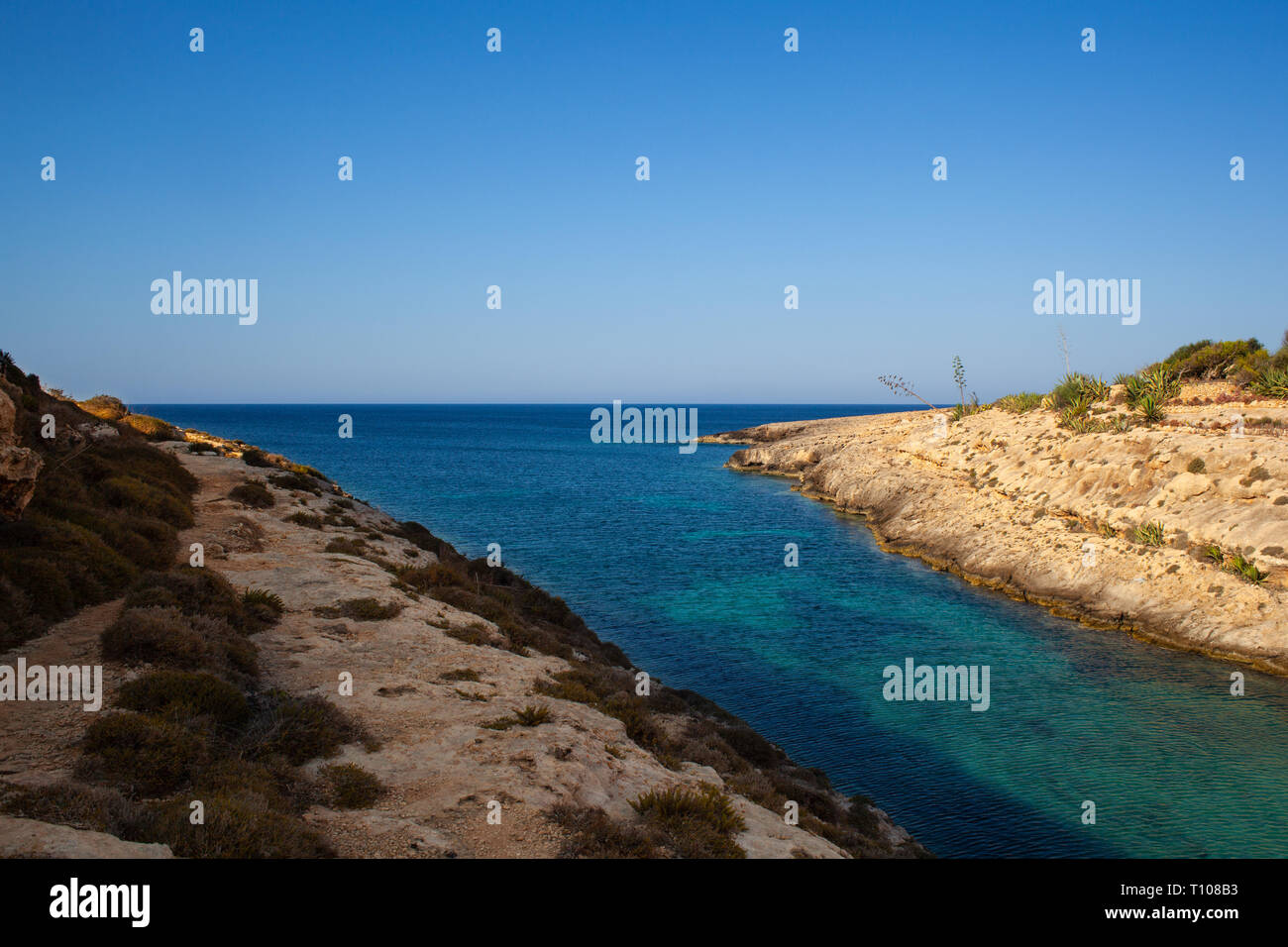 View of Cala Greca in the summer season, Sicily Stock Photo - Alamy
