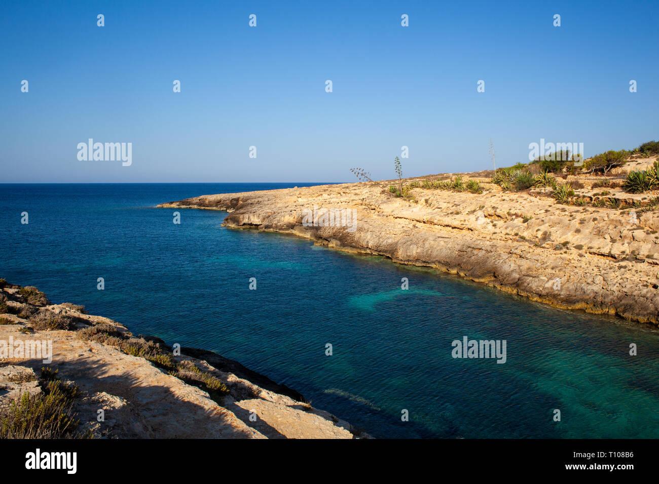 View of Cala Greca in the summer season, Sicily Stock Photo - Alamy