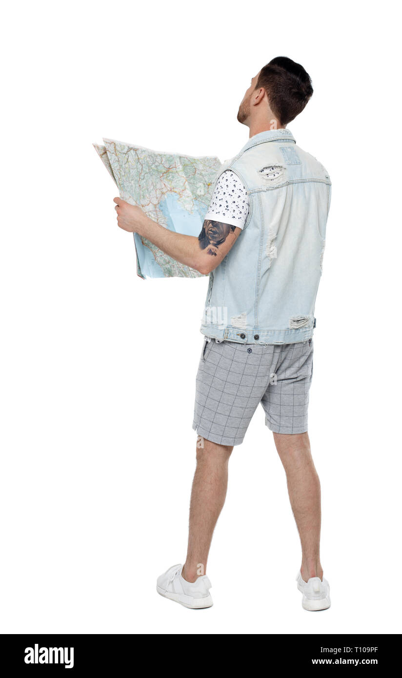 Back view of journey young man looking at the map. Rear view people ...