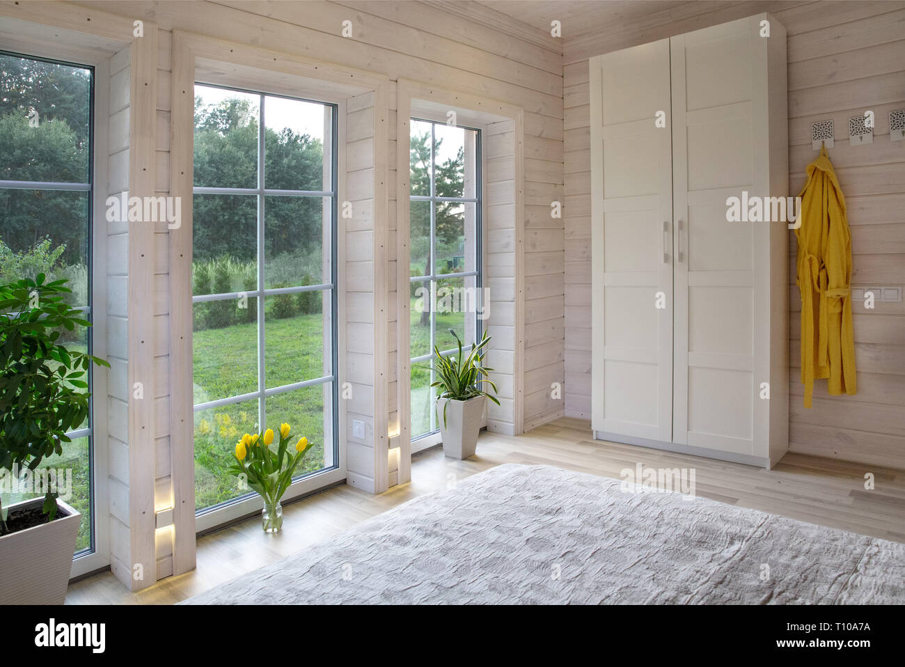 Bright photo studio interior with big window, high ceiling, white ...