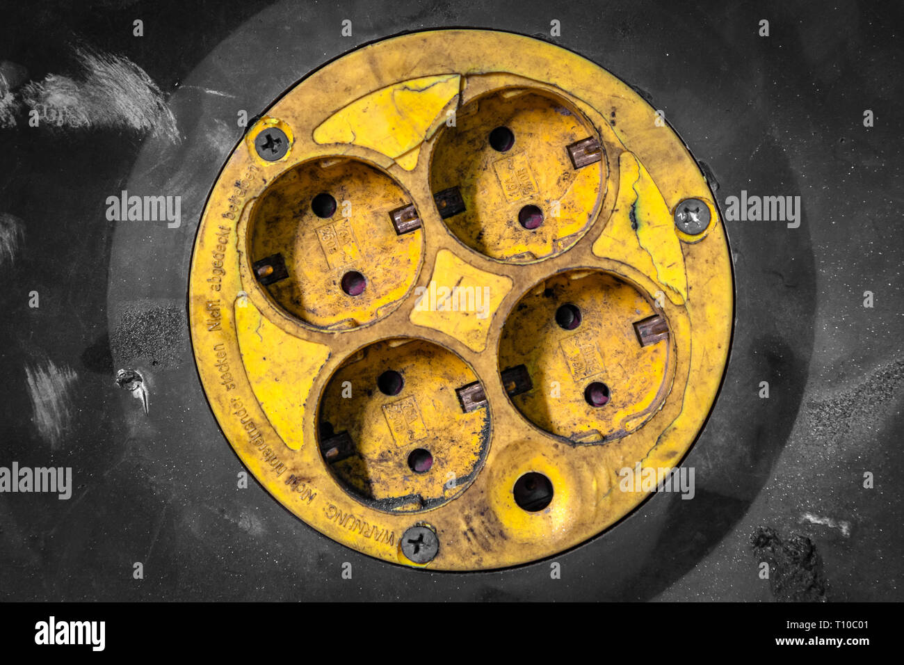 Close-up old yellow electrical outlet portable Stock Photo - Alamy