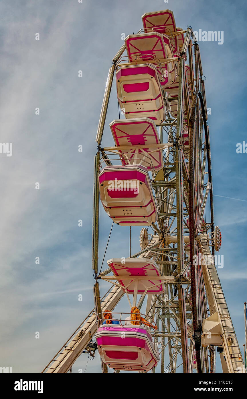 A traditional ferris wheel at a local carnival funfair Stock Photo - Alamy
