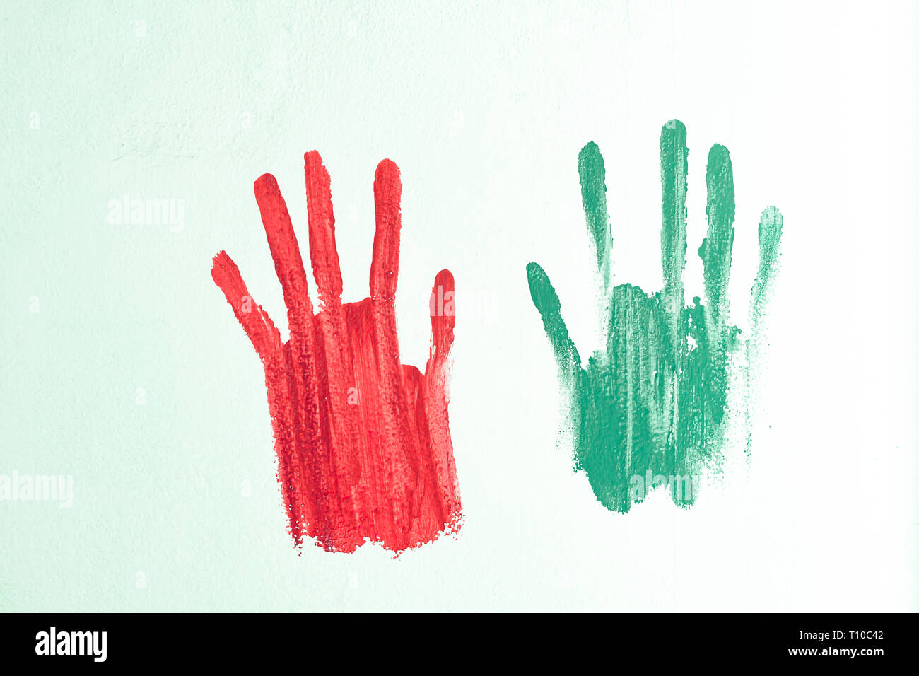 handprint in paint on white wall Stock Photo - Alamy