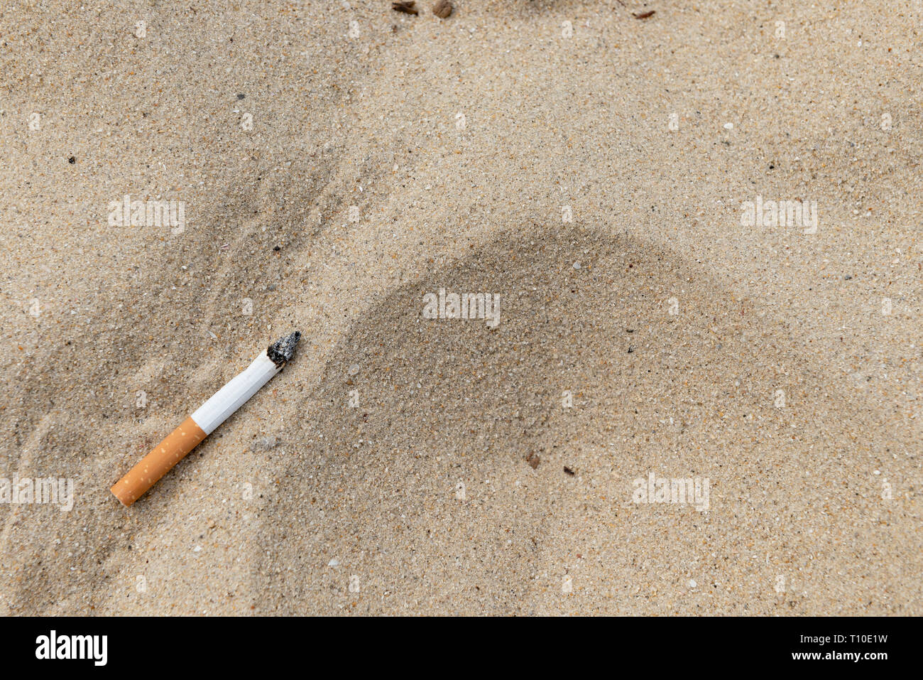 Cigarette as toxic waste hi-res stock photography and images - Alamy