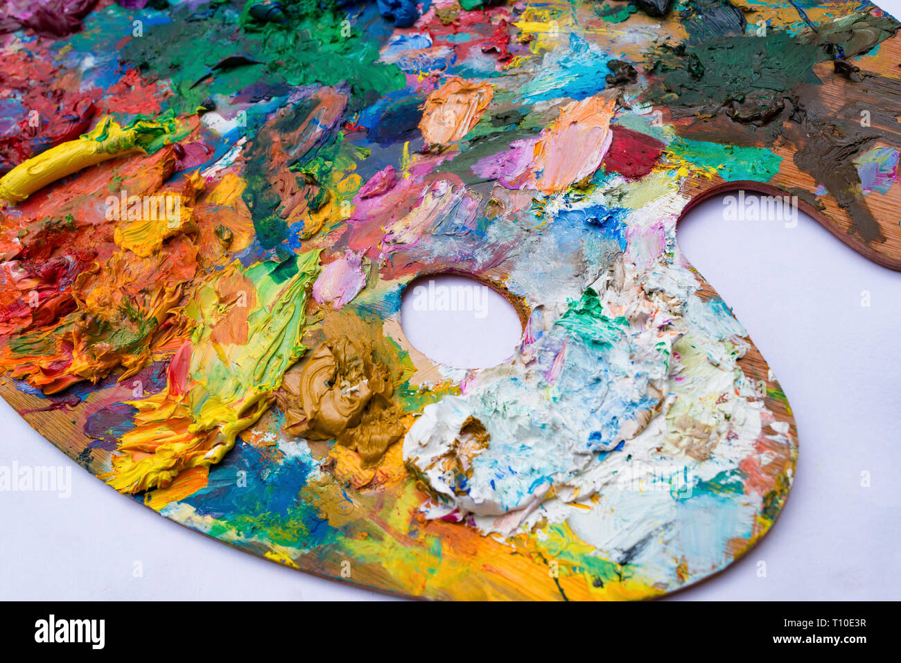 bright oil paint palette close up on white background Stock Photo - Alamy