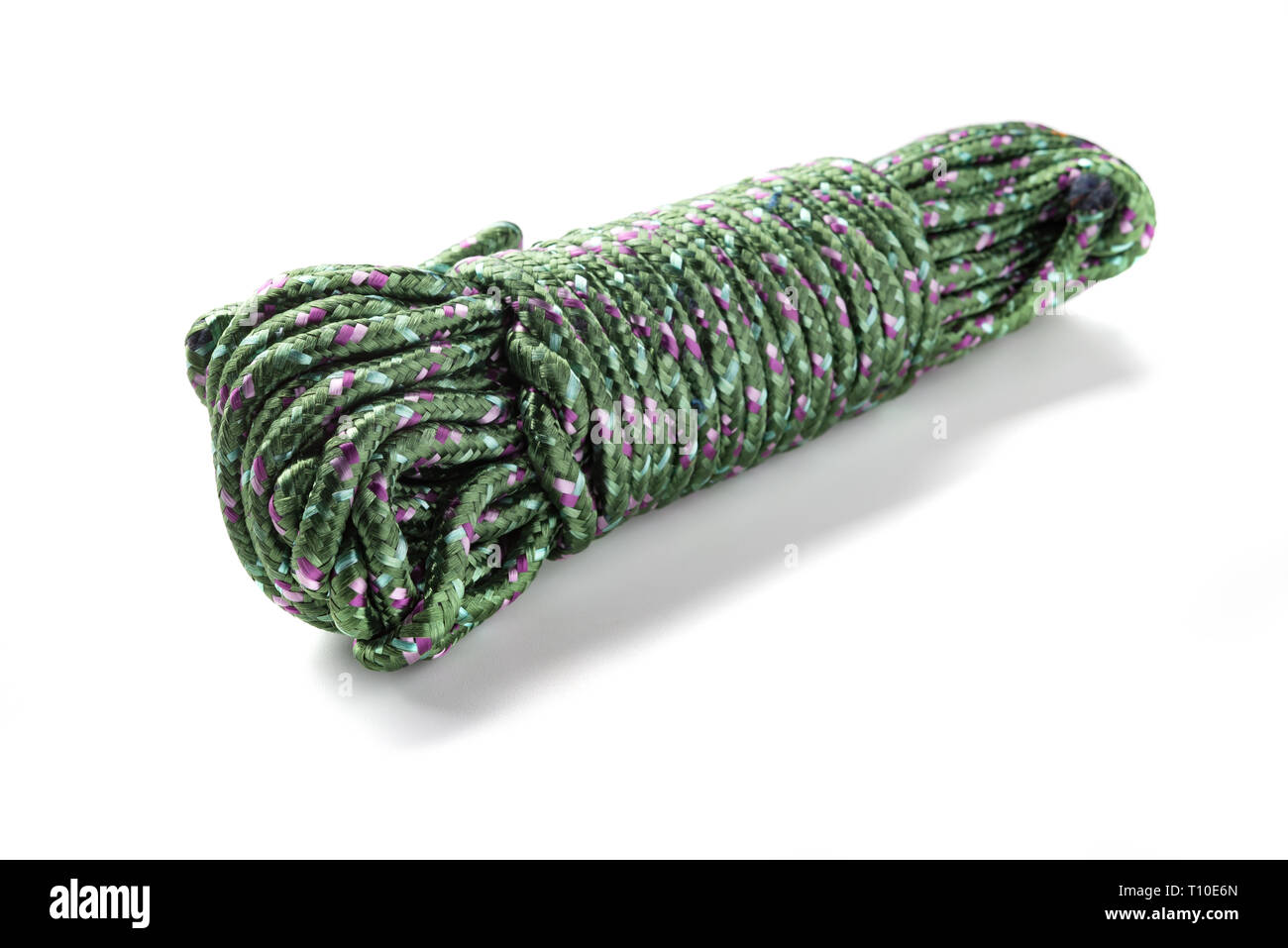 green tied rope on a white background Stock Photo - Alamy