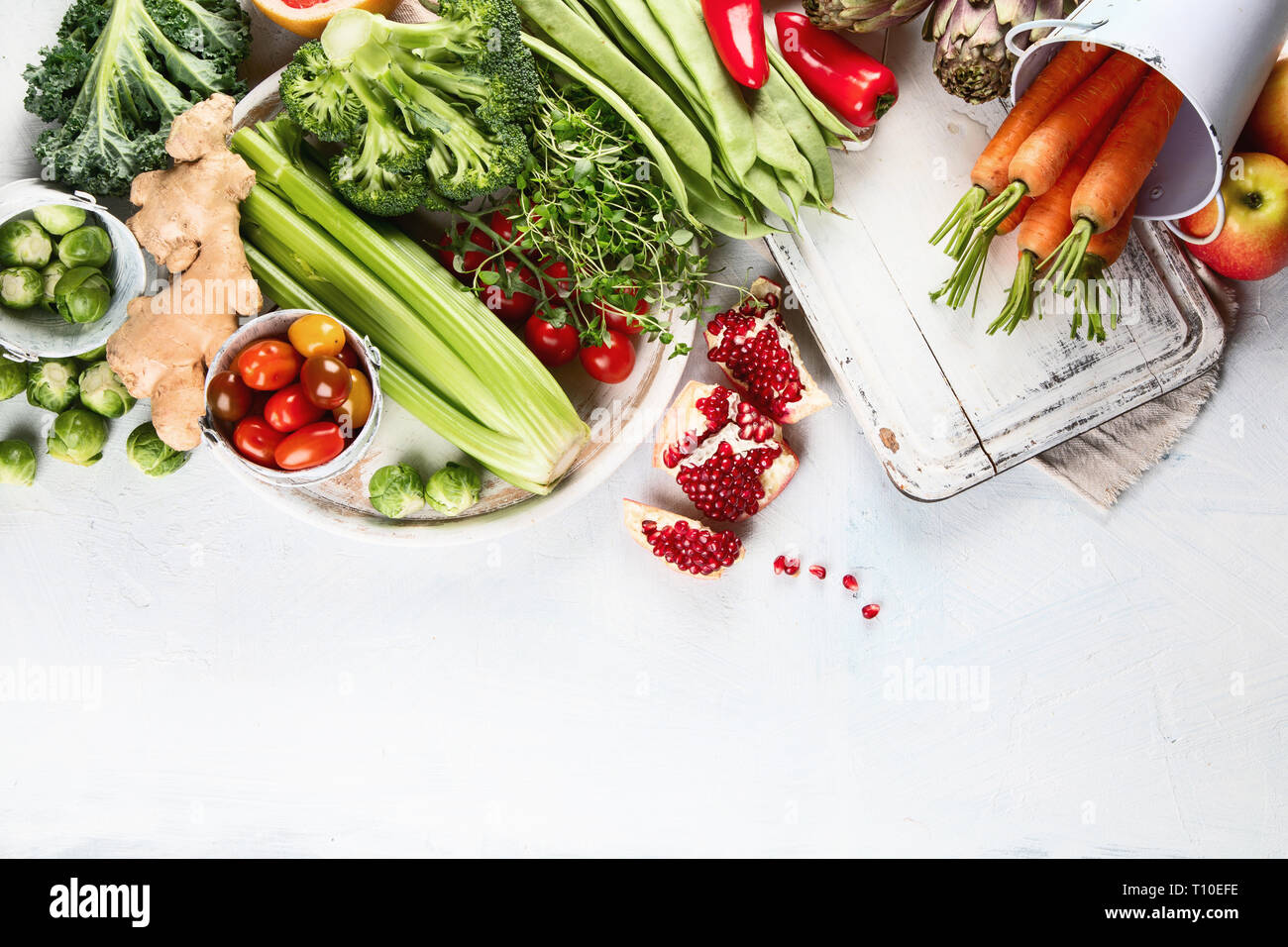 Organic food background. Healthy cooking ingredients - fresh fruits and ...