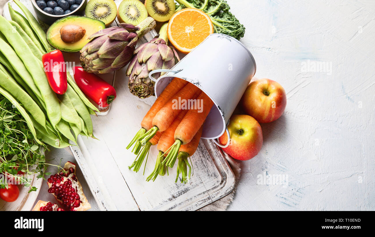 Organic food background. Healthy cooking ingredients - fresh fruits and ...