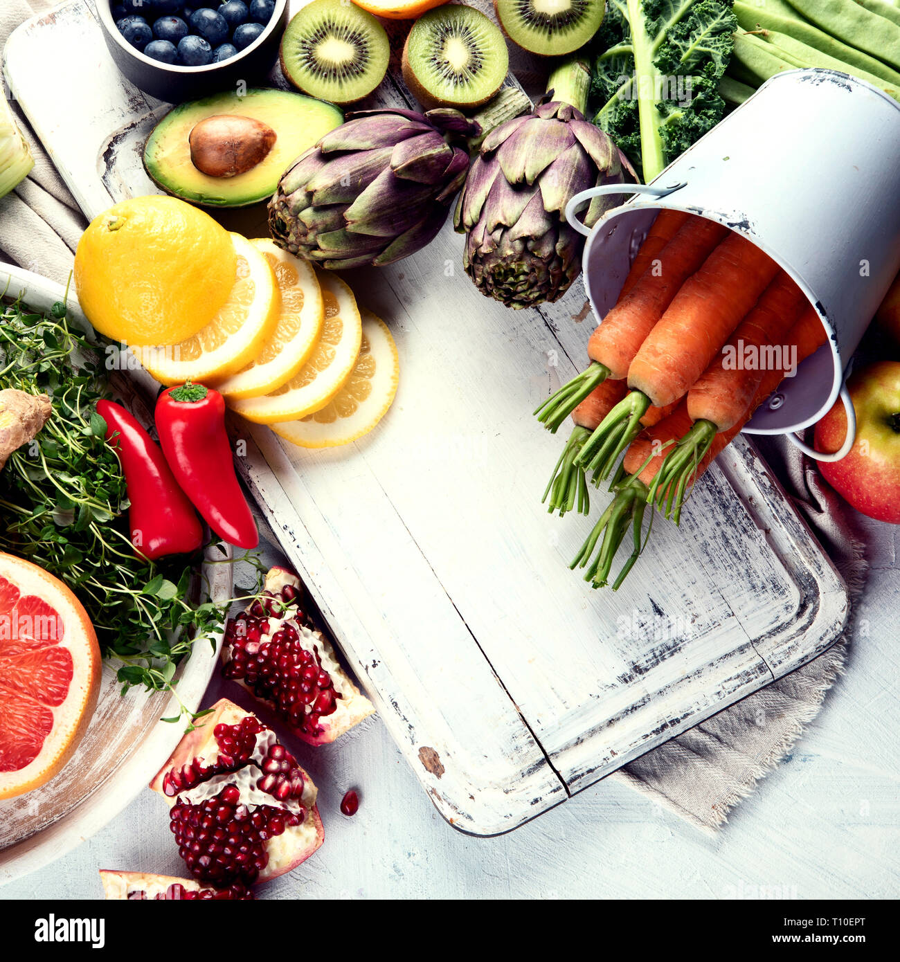 Organic food background. Healthy cooking ingredients - fresh fruits and ...