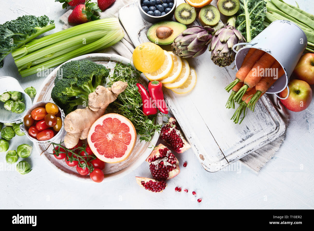 Organic food background. Healthy cooking ingredients - fresh fruits and ...