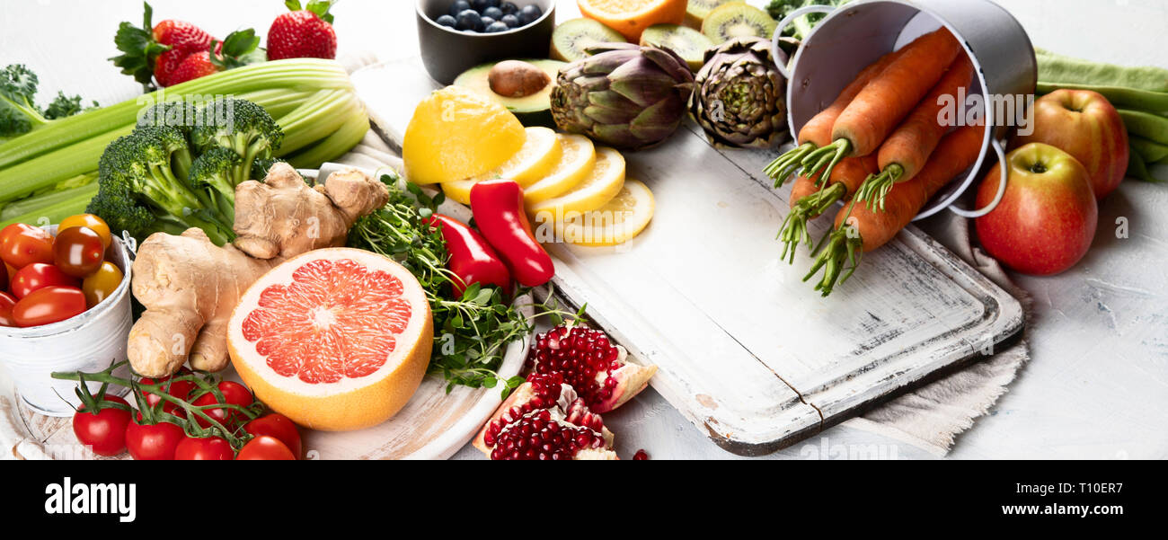 Organic food background. Healthy cooking ingredients - fresh fruits and ...