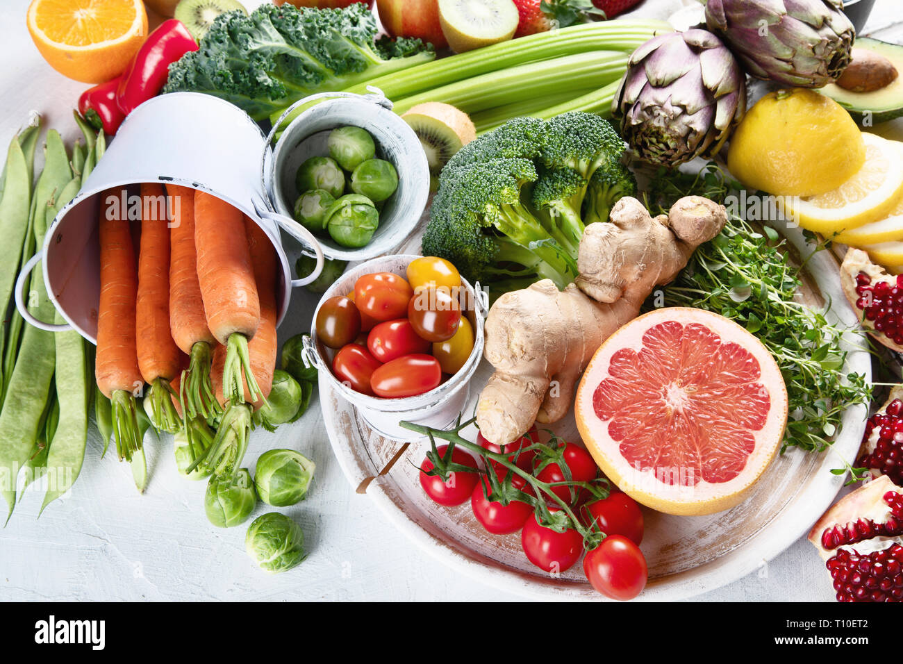 Organic food background. Healthy cooking ingredients - fresh fruits and ...