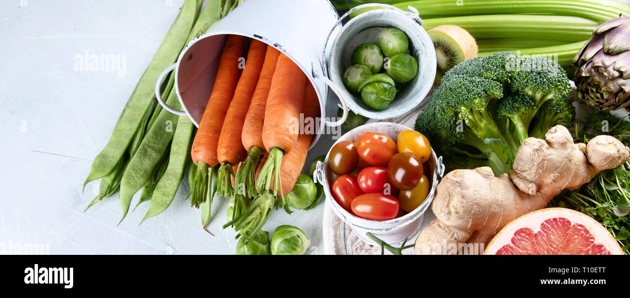 Organic food background. Healthy cooking ingredients - fresh fruits and ...