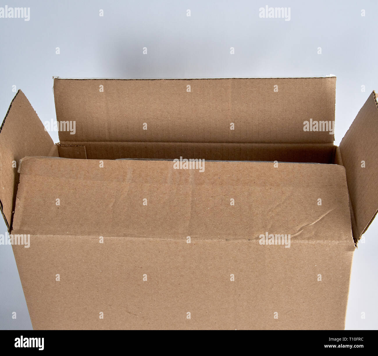 open brown paper box on white background, top view Stock Photo - Alamy