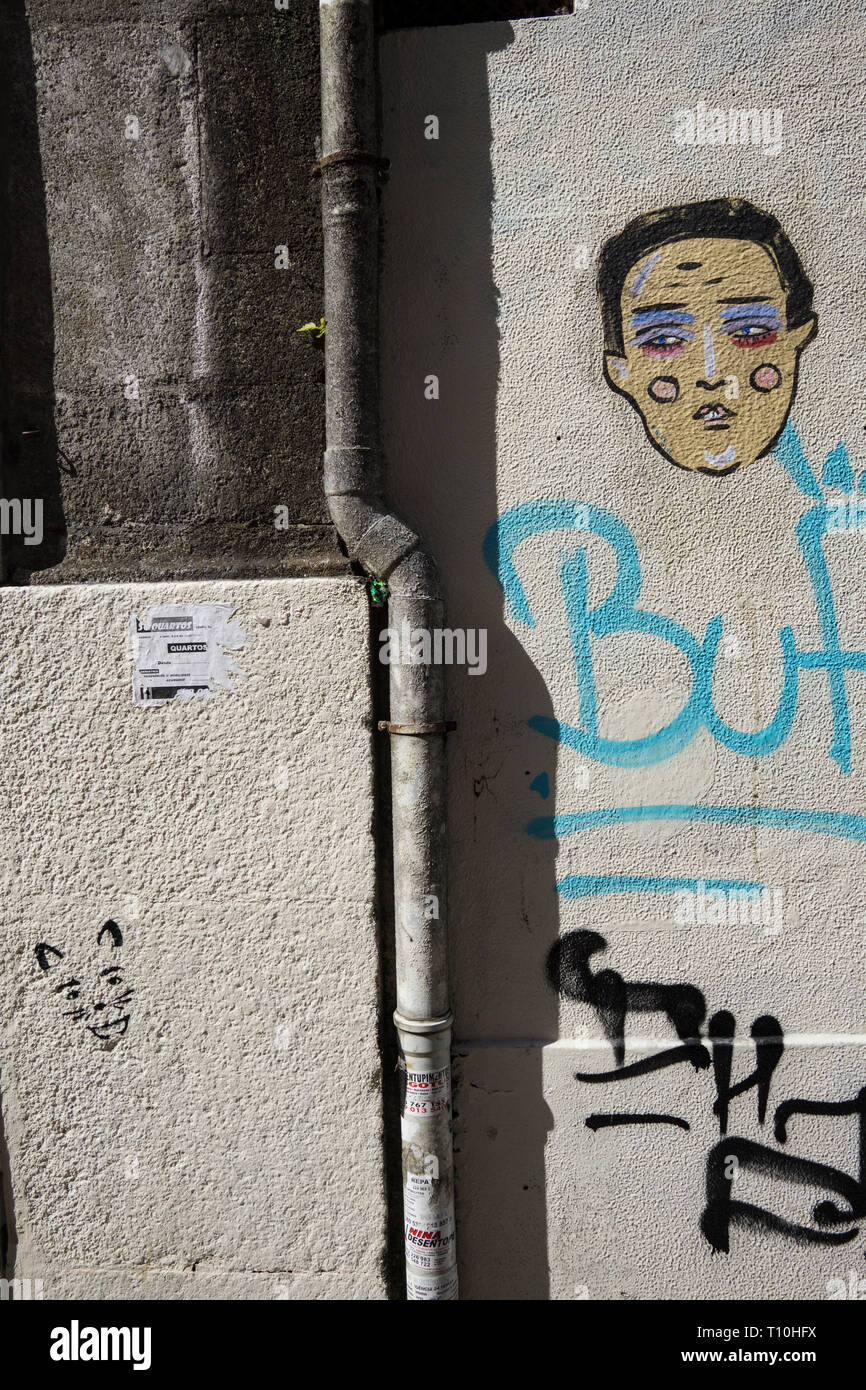 Face on wall Stock Photo - Alamy