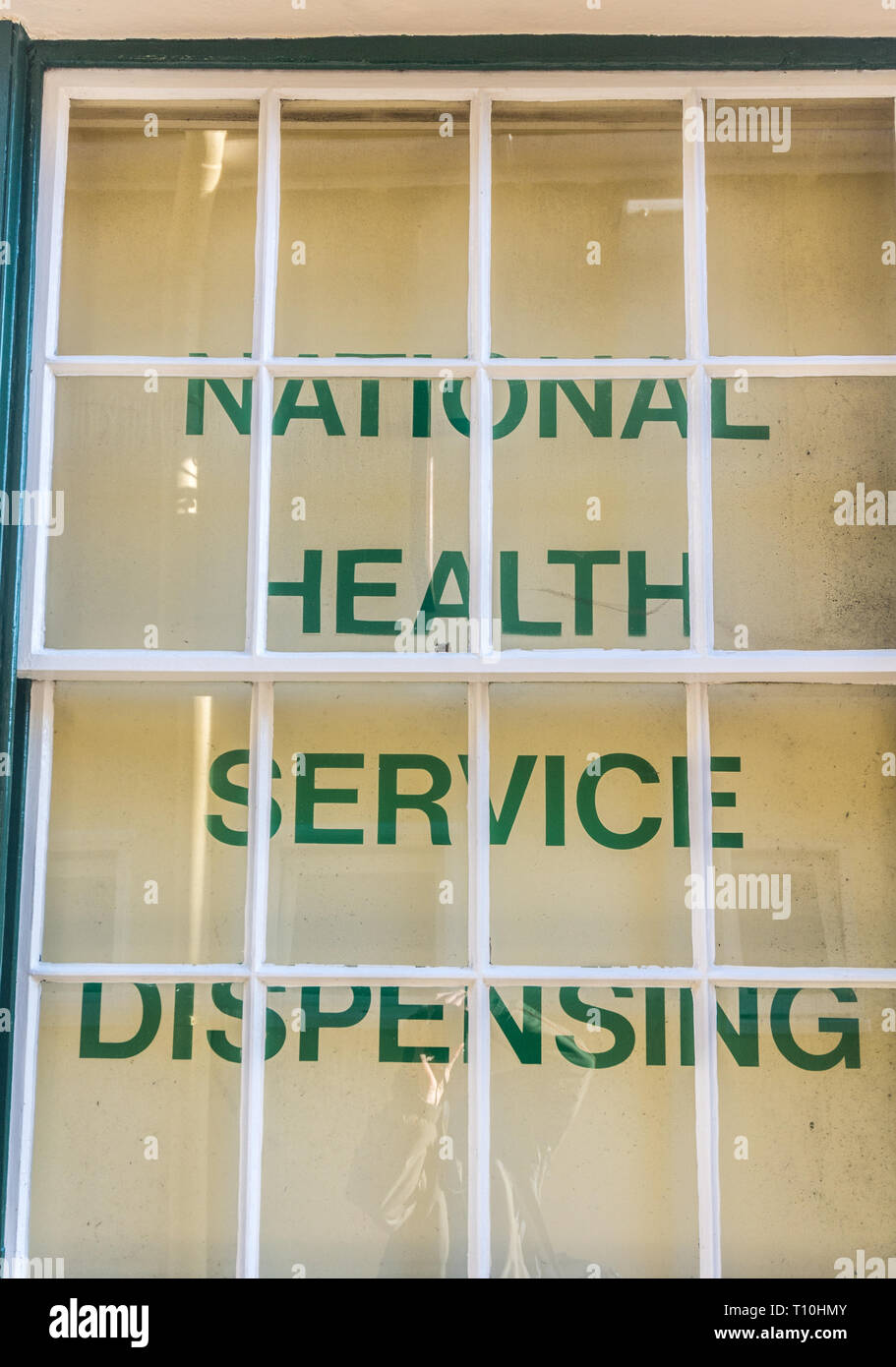 Nhs sign in small chemists window hi-res stock photography and images ...