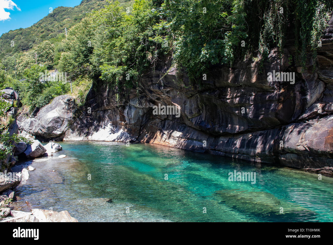 Crystal blue water river in switzerland Stock Photo - Alamy