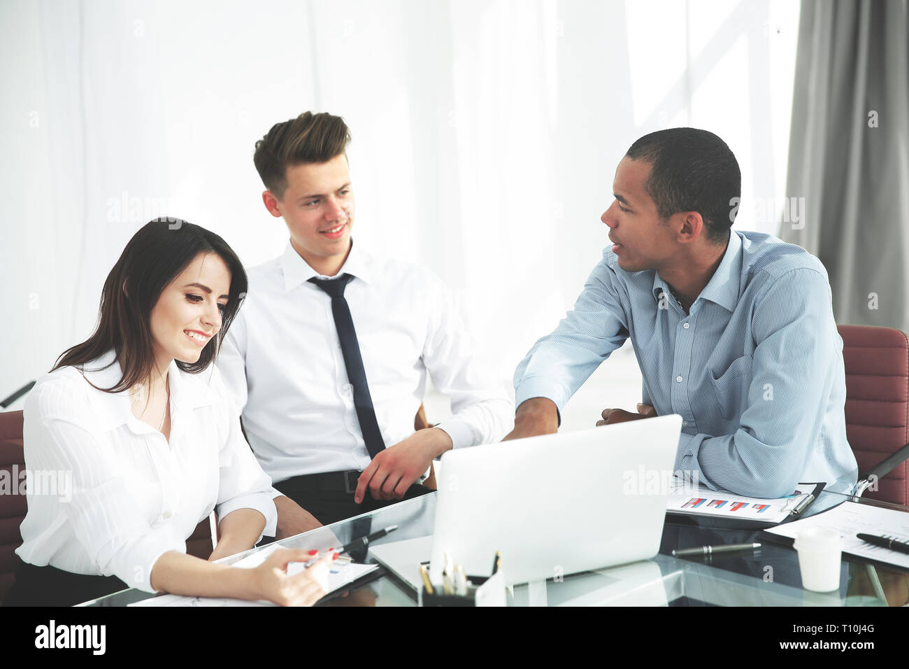 business team discussing business issues in office Stock Photo - Alamy