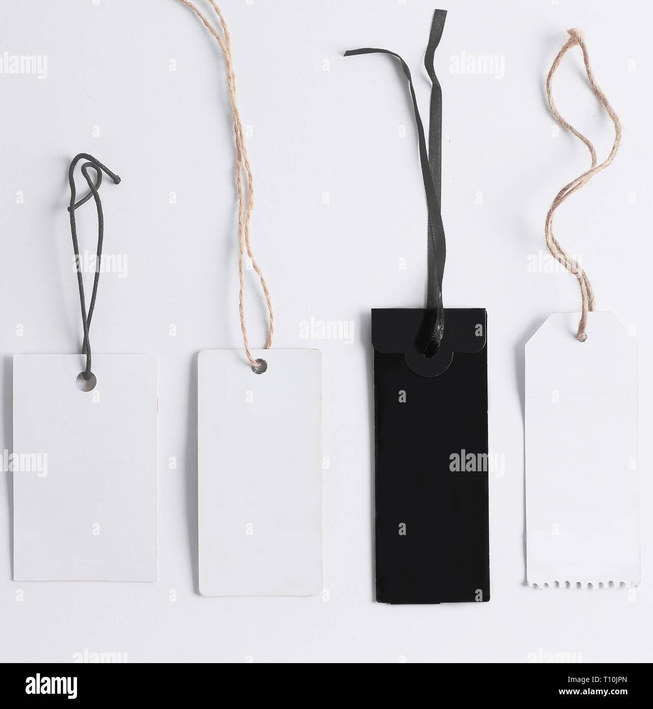 collection of decorative labels from a cardboard Stock Photo - Alamy