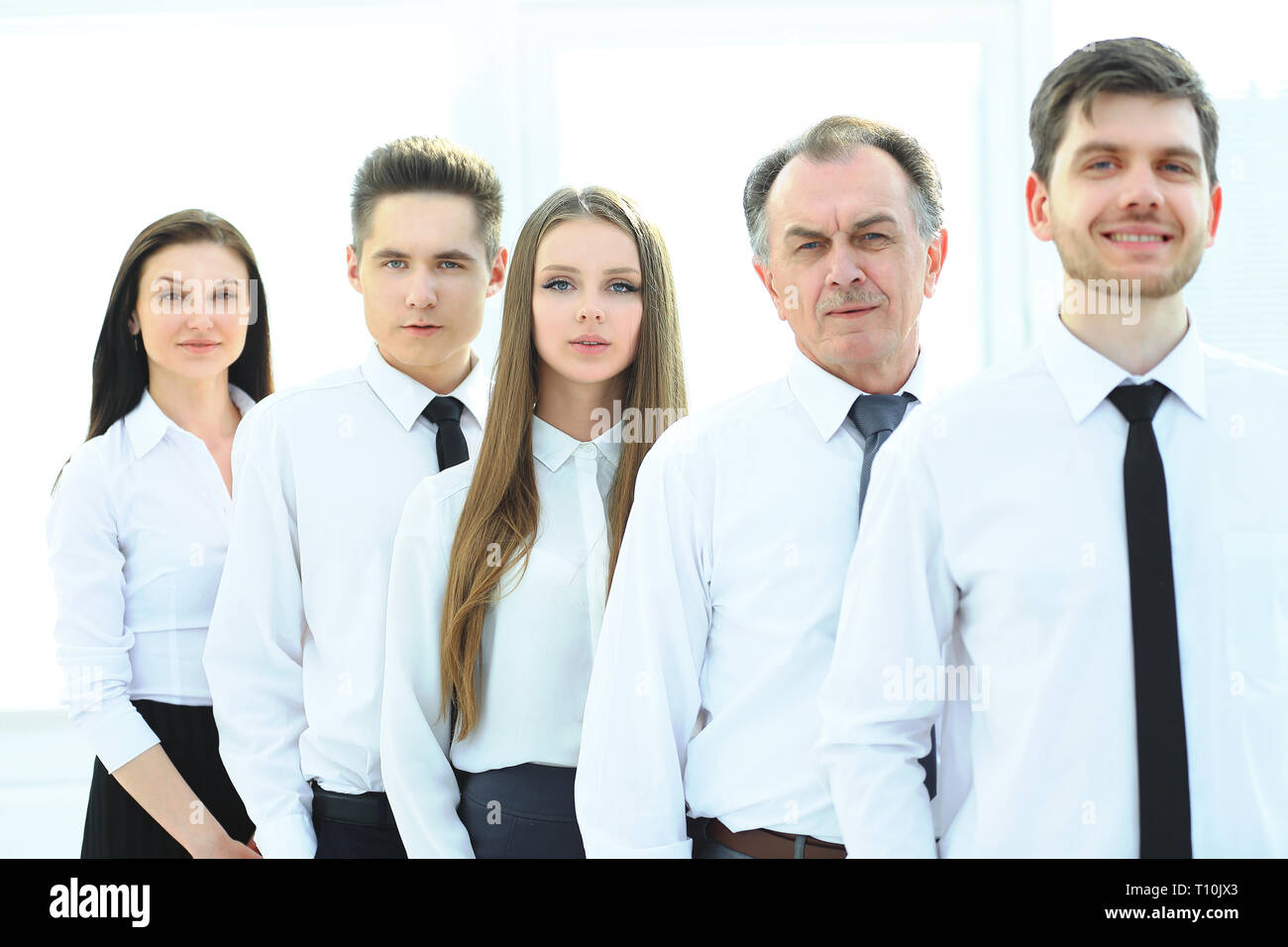 Group of business people at the office lined up Stock Photo - Alamy