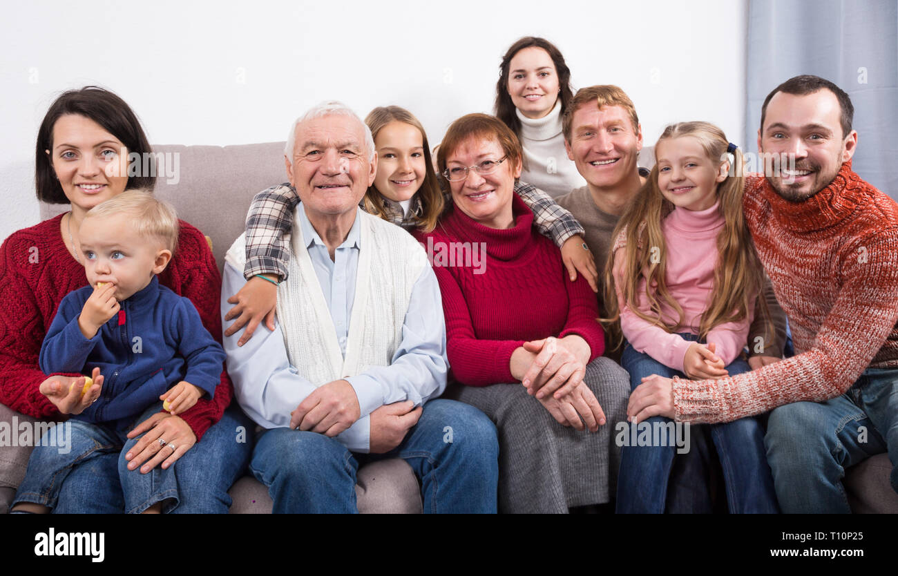 Family members making the family photo during reunion party Stock Photo ...