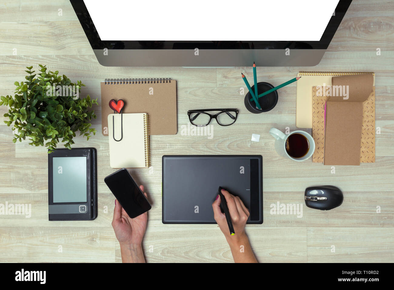 Hand of graphic designer working with stilus and tablet Stock Photo - Alamy