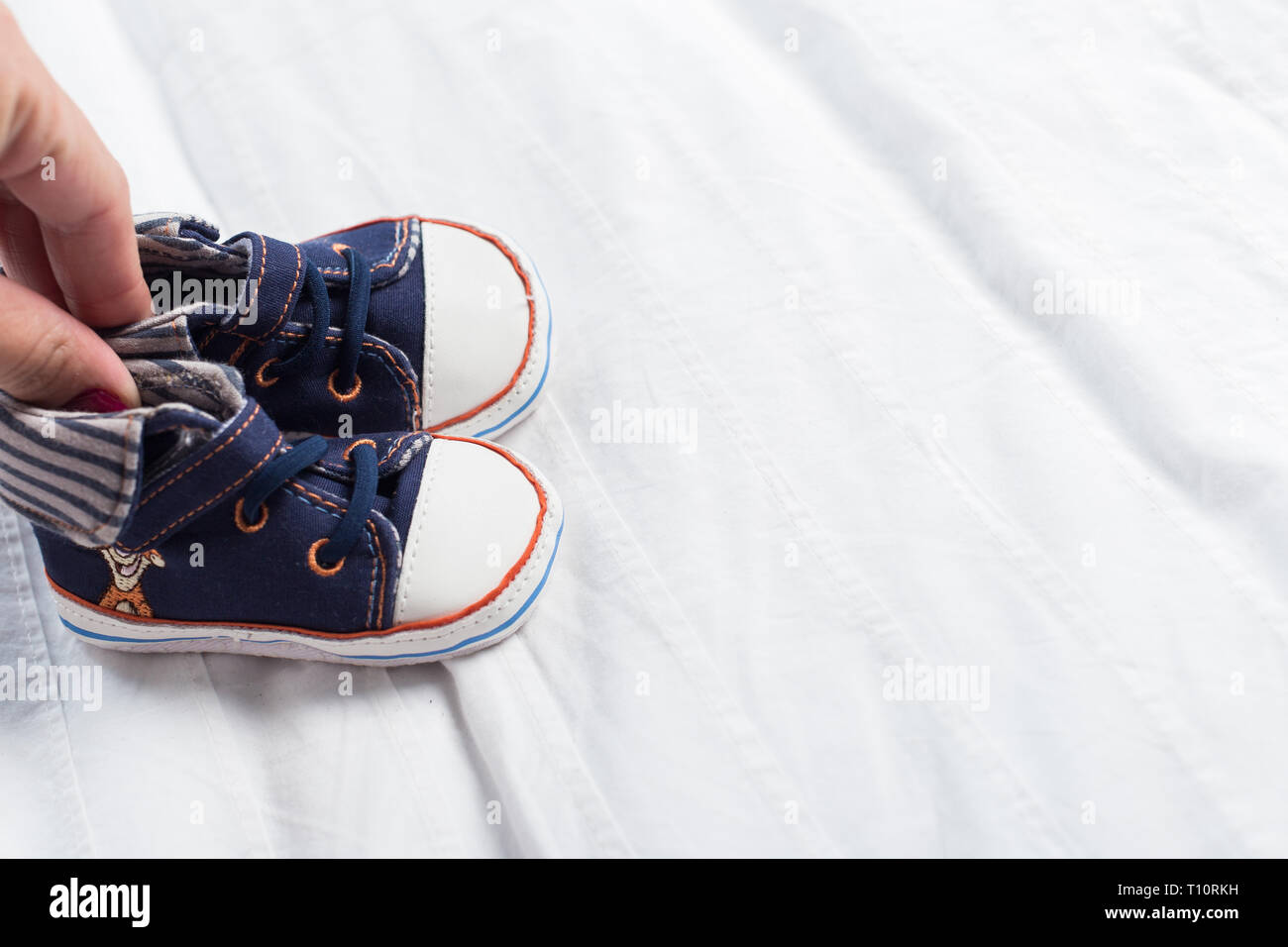 baby booties for little boy Stock Photo - Alamy