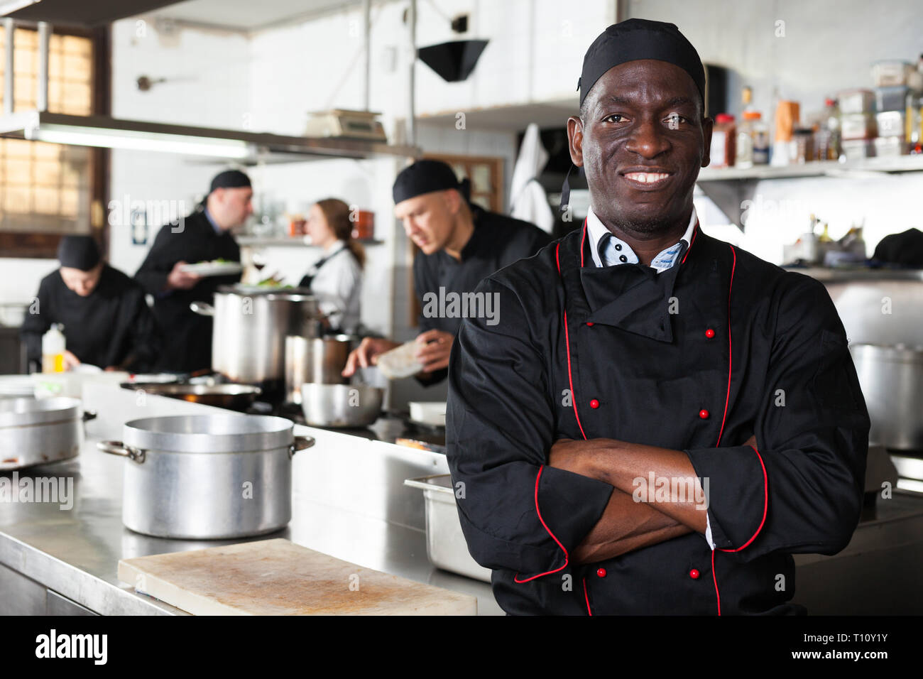 African american professional chef male in kitchen of restaurat Stock ...