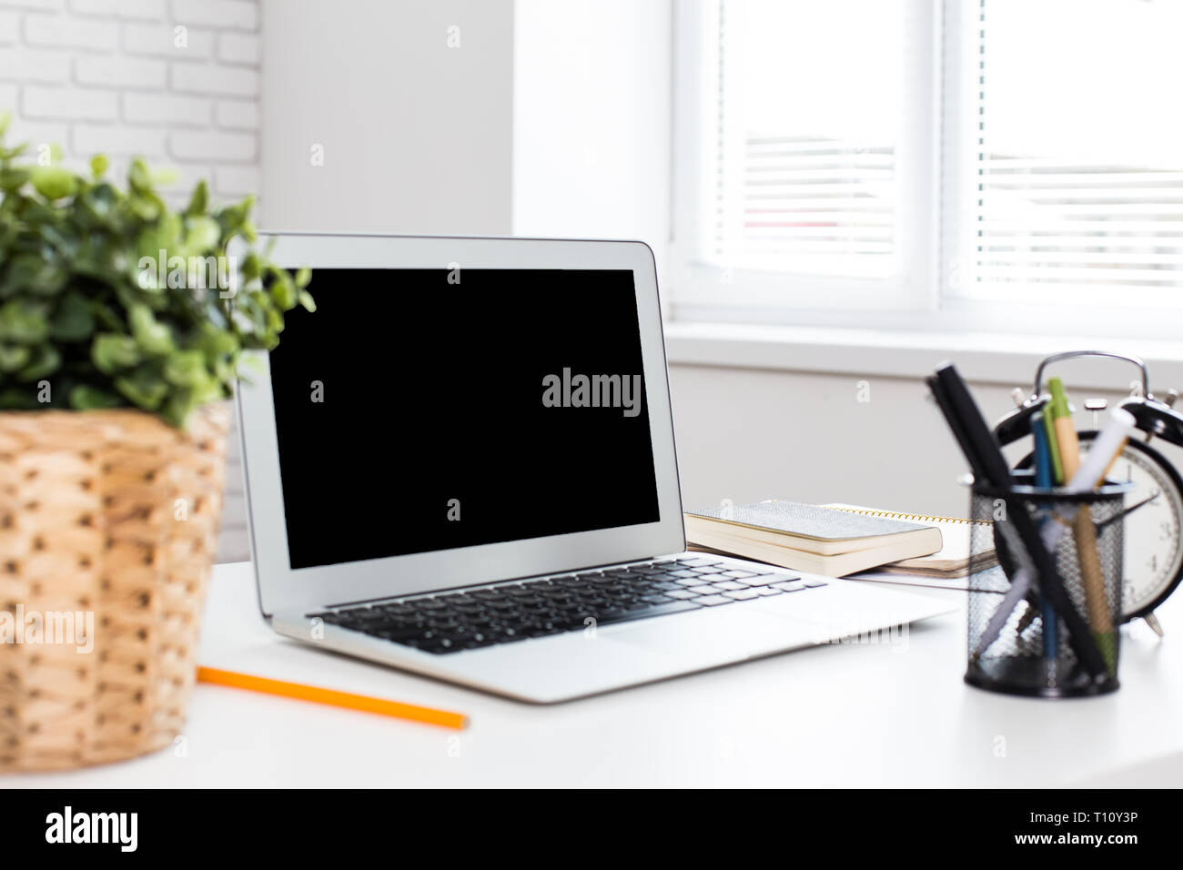 Office workplace with laptop Stock Photo - Alamy