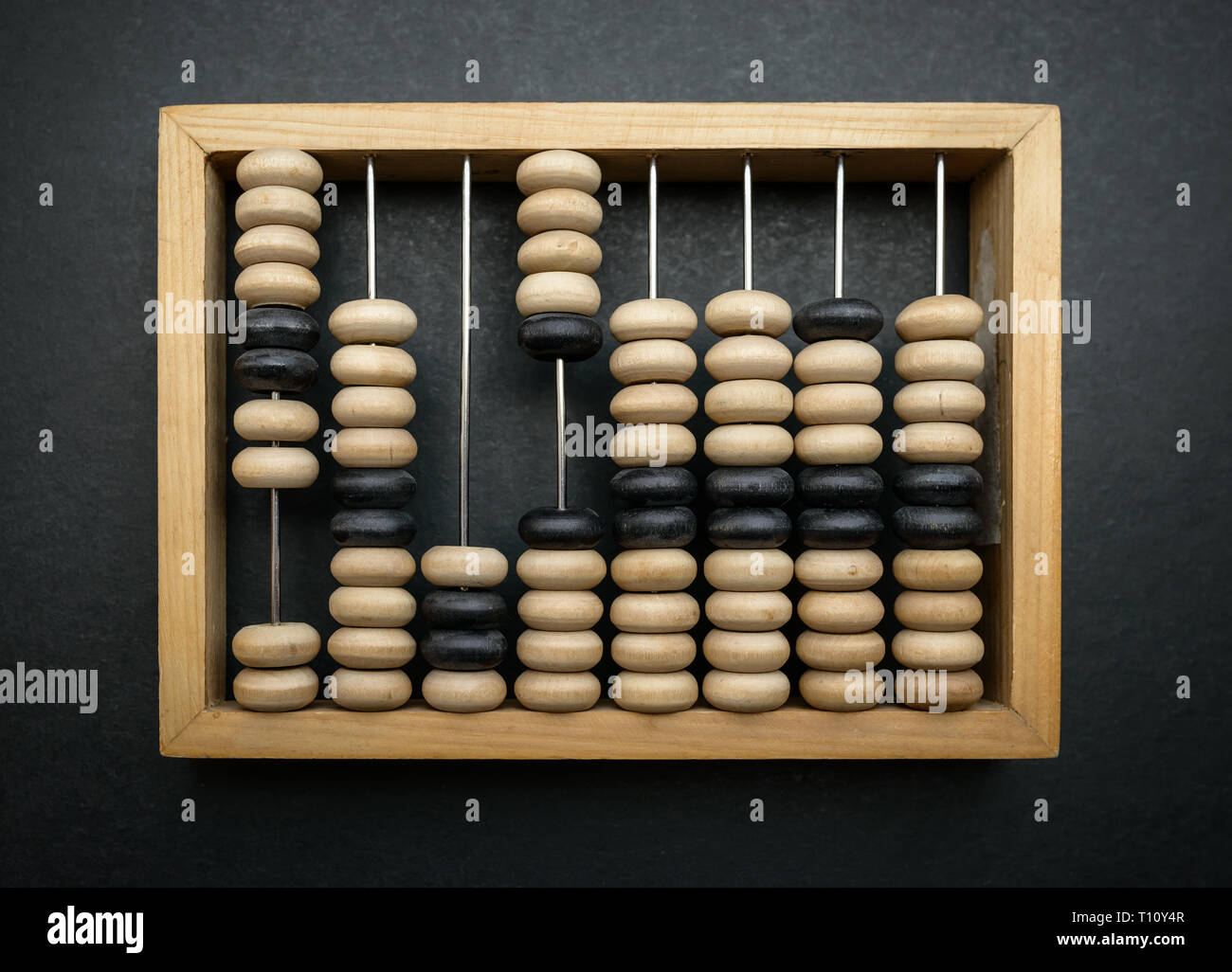 Old wooden abacus on dark background Stock Photo - Alamy