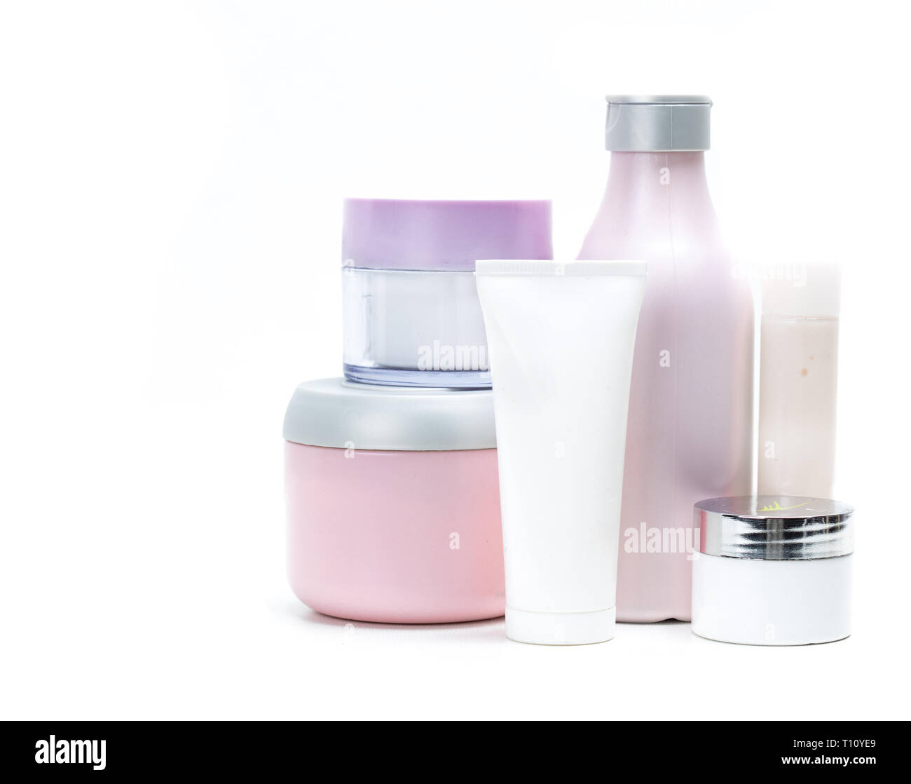 Cosmetic containers isolated on white Stock Photo - Alamy