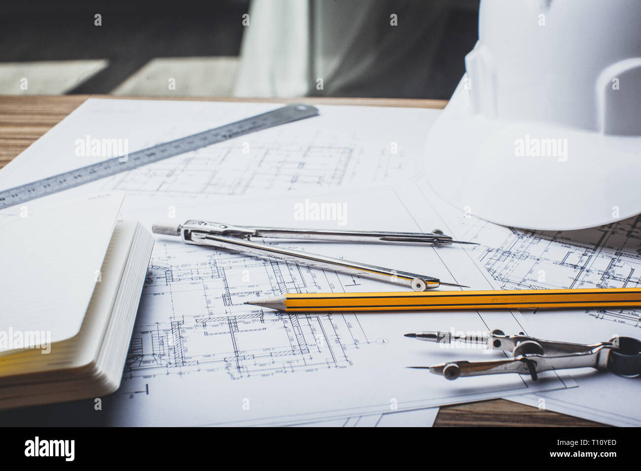 Project drawings and tools, close up Stock Photo - Alamy