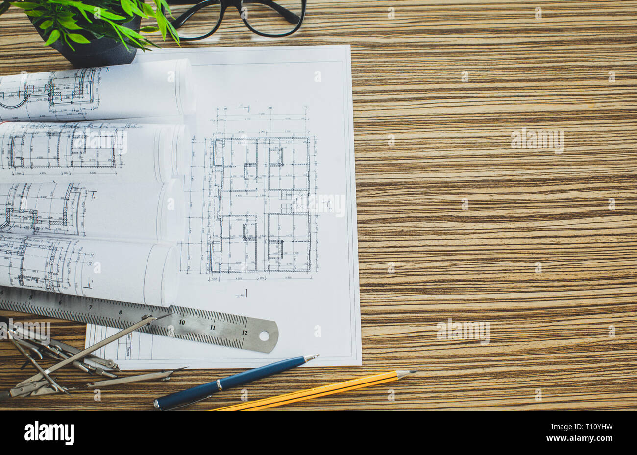 Project drawings and tools, close up Stock Photo - Alamy