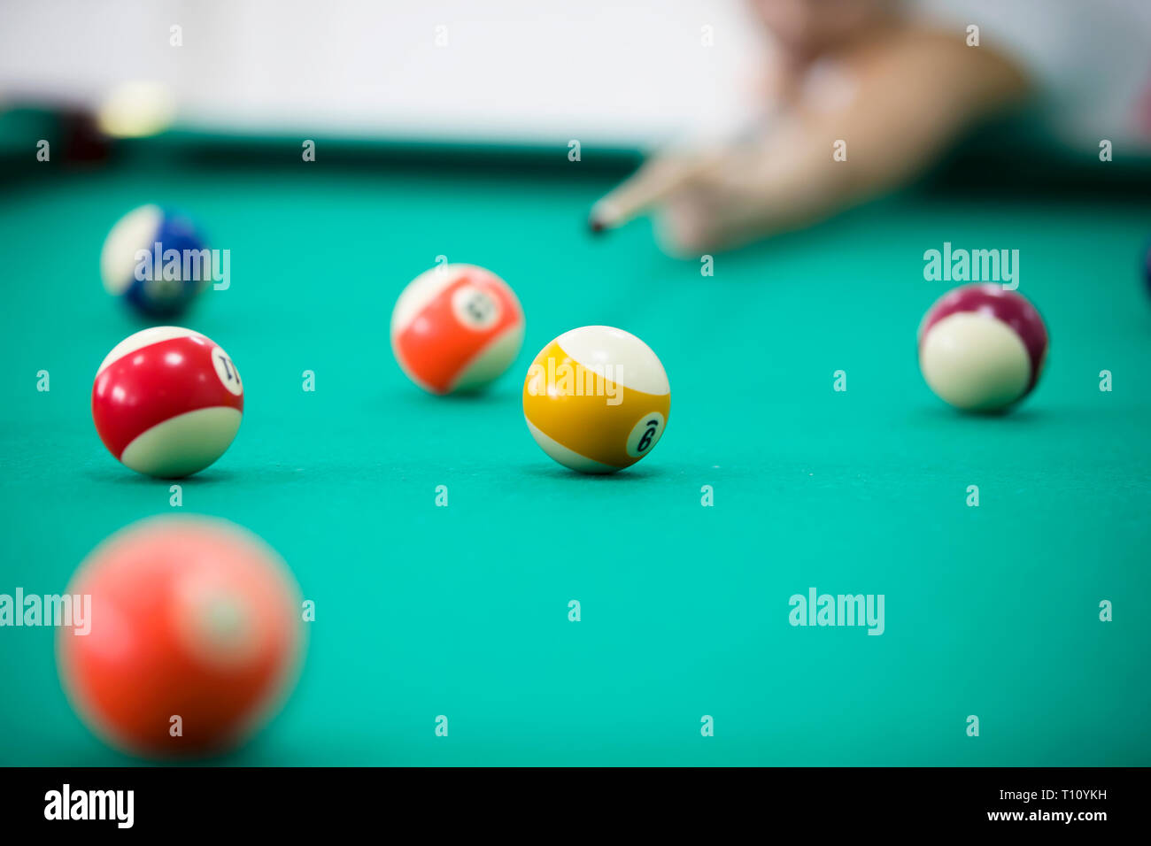 Billiard balls on a green background. Billiards game Stock Photo - Alamy